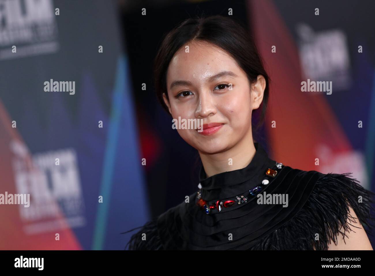 Lucie Zhang poses for photographers upon arrival at the premiere of the ...