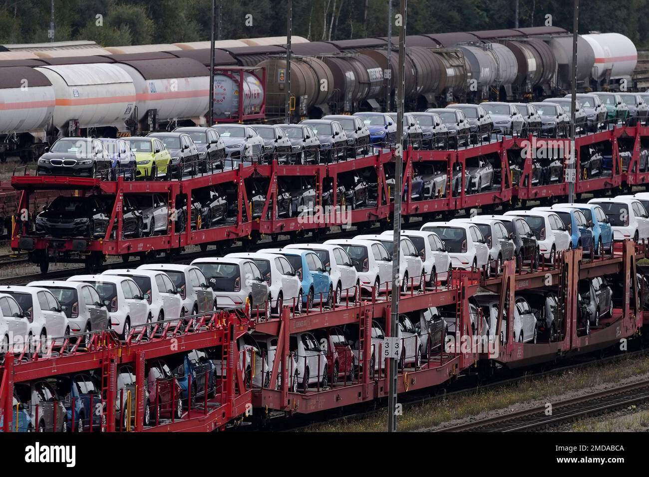 Brand new cars of German car manufacturer Volkswagen and BMW are parked ...