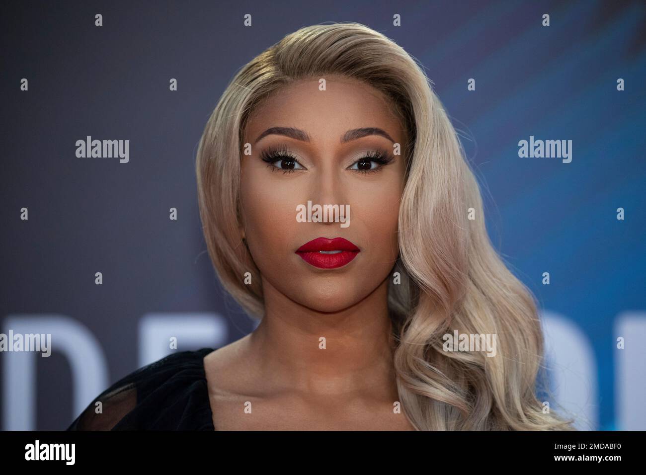 Toni Tone poses for photographers upon arrival at the premiere of the ...