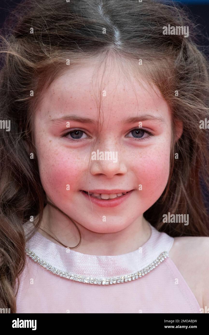 Ellie Blake poses for photographers upon arrival at the premiere of the film 'The Lost Daughter ...