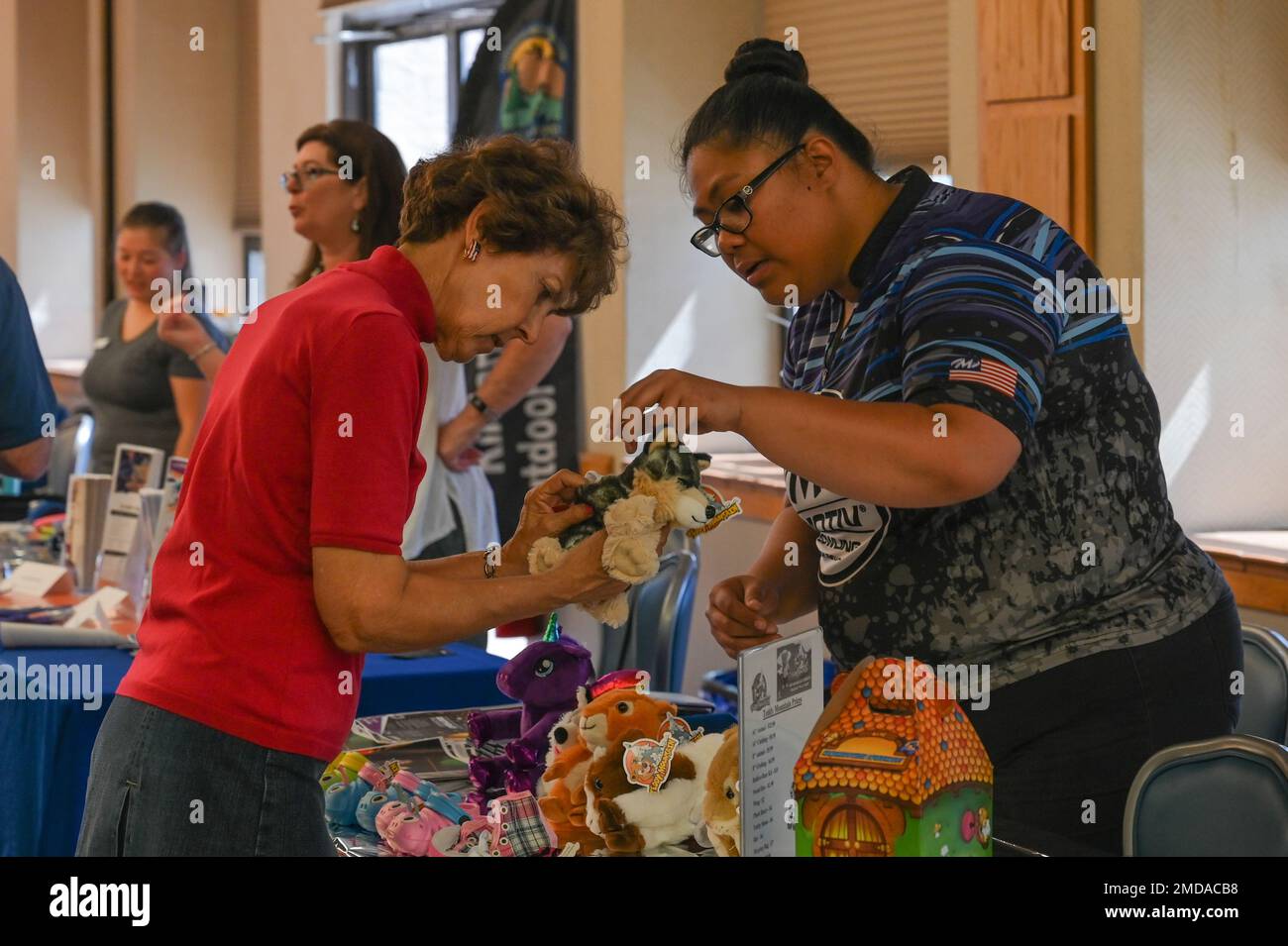 Sally Uebelacker, KAFB retiree activities office director, purchases a ...