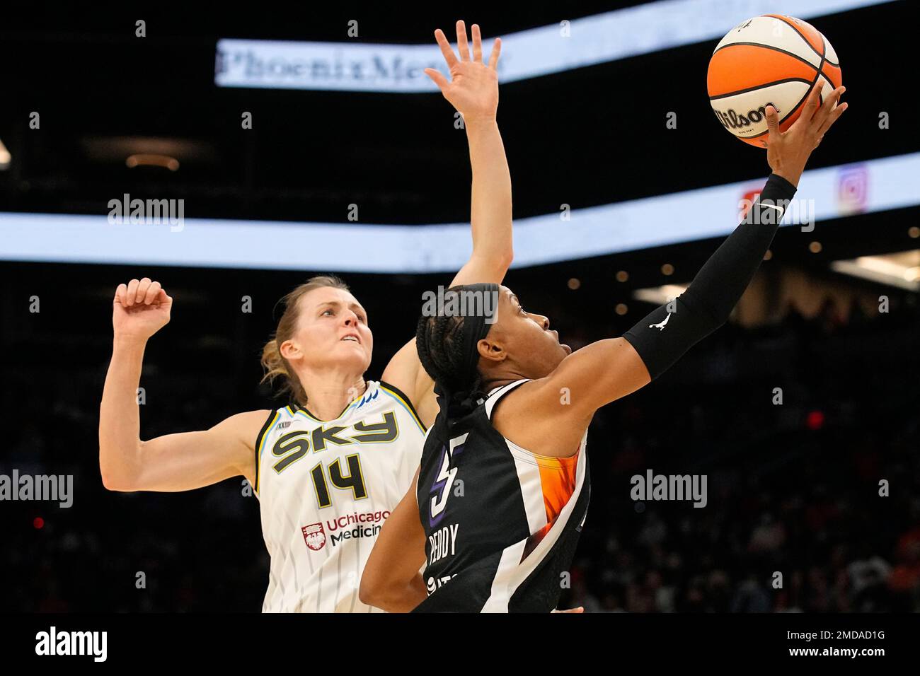 Phoenix Mercury guard Shey Peddy drives past Chicago Sky guard Allie ...