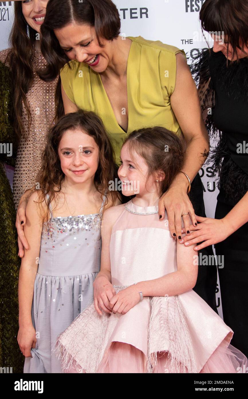 Director Maggie Gyllenhaal holds Robyn Elwell, left front and Ellie ...