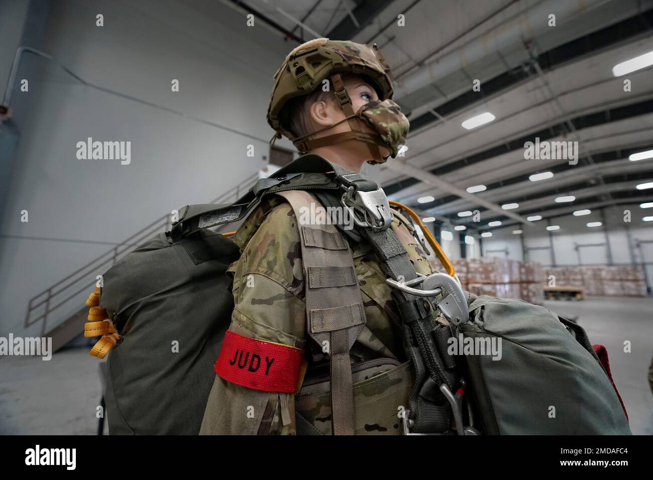 A fully equipped paratrooper mannequin is on display for members of the ...