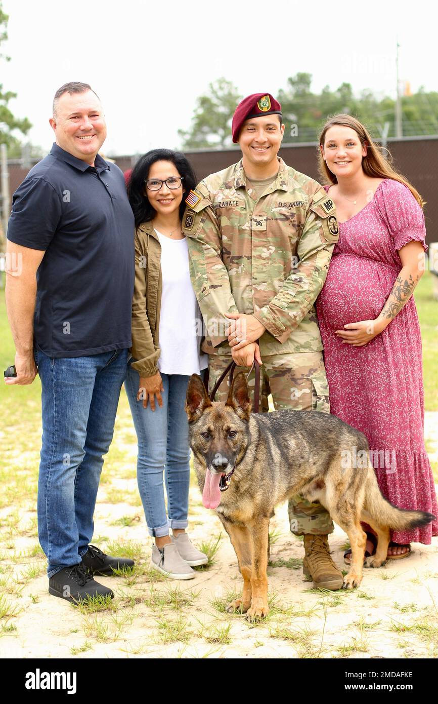 Alex stands ready for retirement with his adoptive family at his ...