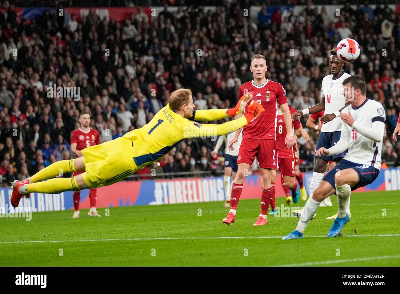 Hungary's goalkeeper Peter Gulacsi dives to punch the ball away from ...