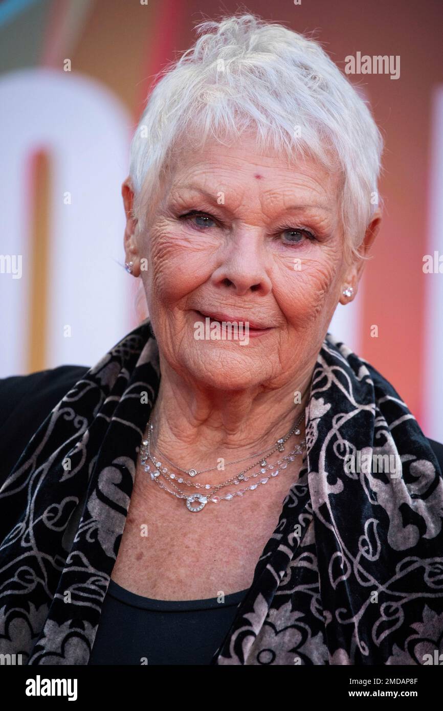 Judi Dench poses for photographers upon arrival at the premiere of the ...