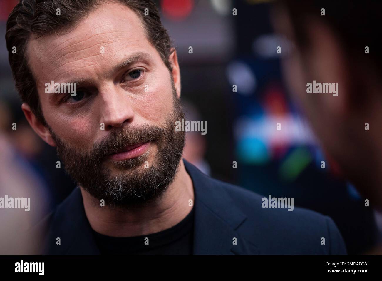 Jamie Dornan is interviewed upon arrival at the premiere of the film ...