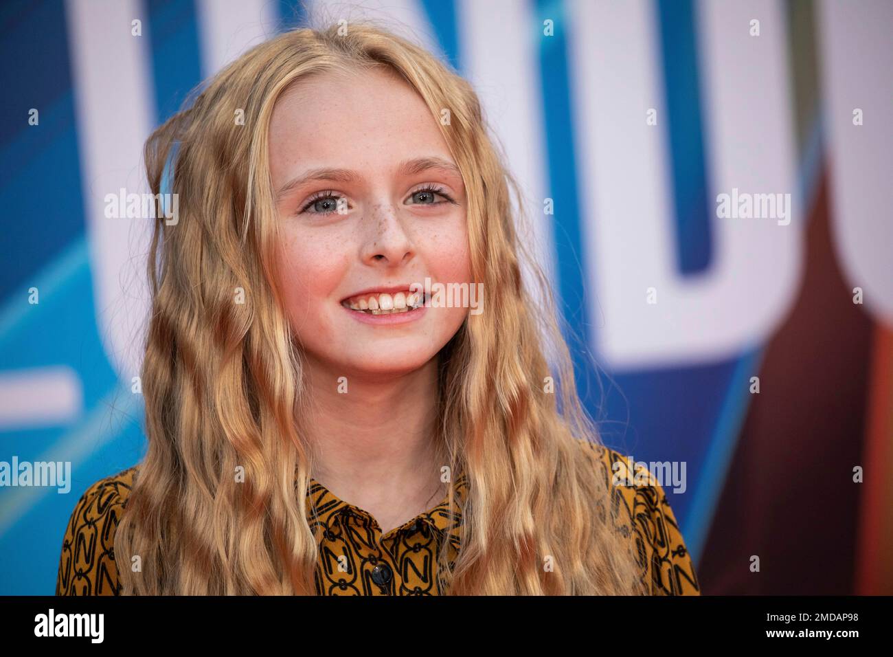 Olive Tennant poses for photographers upon arrival at the premiere of ...