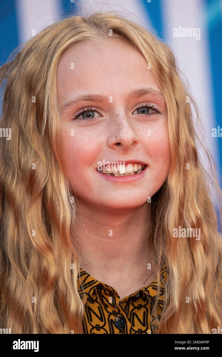 Olive Tennant poses for photographers upon arrival at the premiere of ...