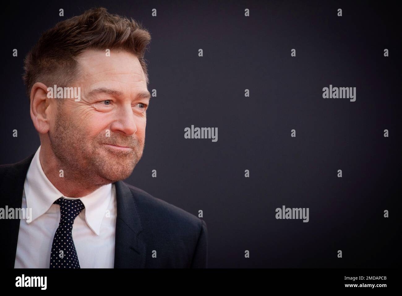 Kenneth Branagh poses for photographers upon arrival at the premiere of ...