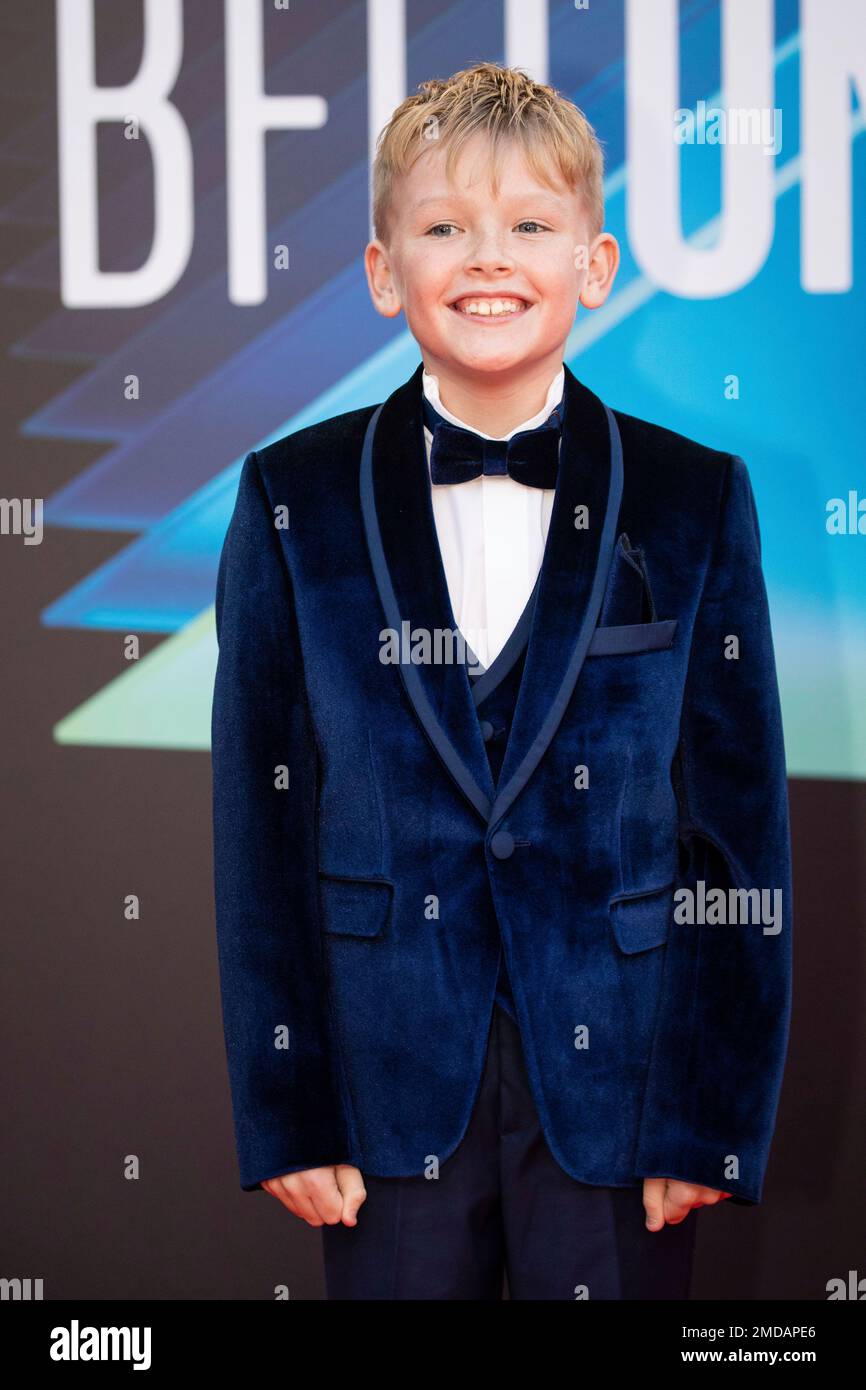 Jude Hill poses for photographers upon arrival at the premiere of the ...