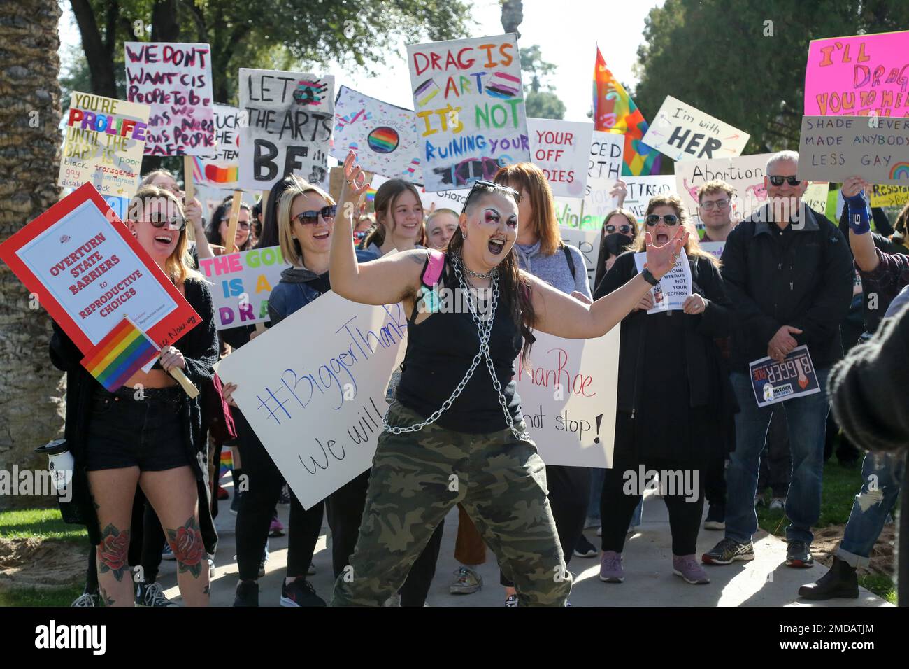 Event organizer Noelle Canez poses before the march begins at the ...