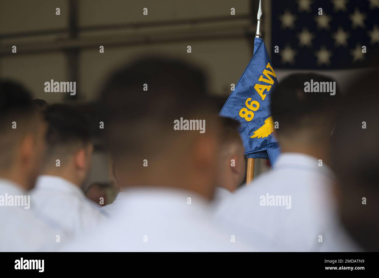 Airmen and Guardians from the 86th Airlift Wing stand in formation ...