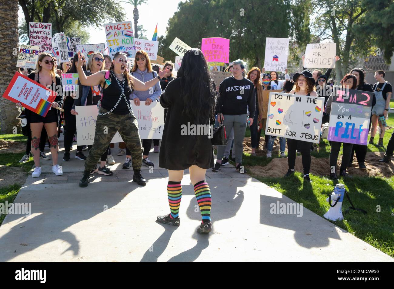 Event organizer Noelle Canez poses before the march begins at the ...