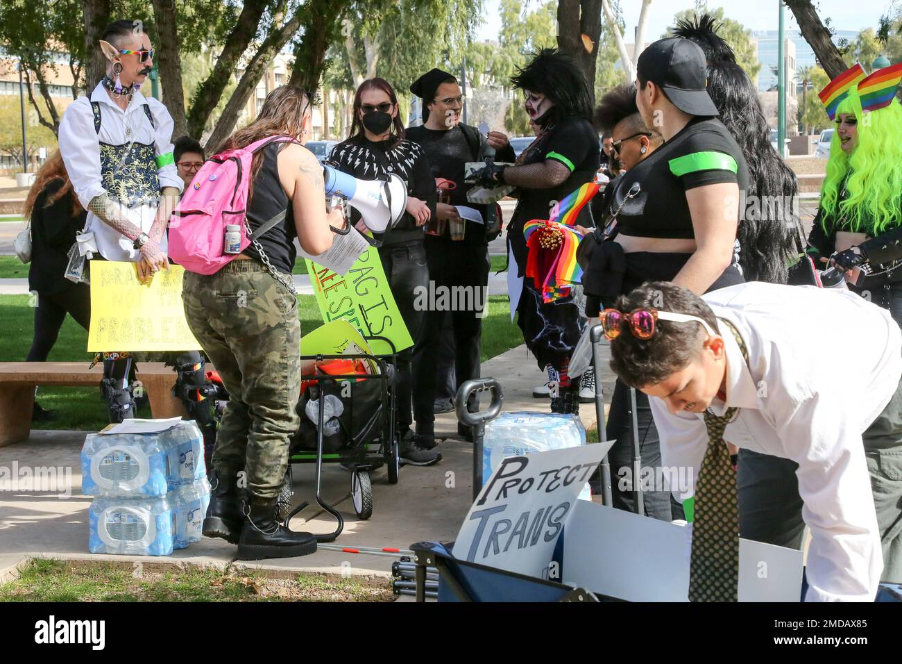 Event organizer Noelle Canez hands out various duties to volunteers ...