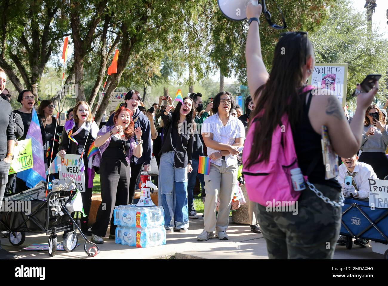 Event organizer Noelle Canez energizes the crowd before the start of ...