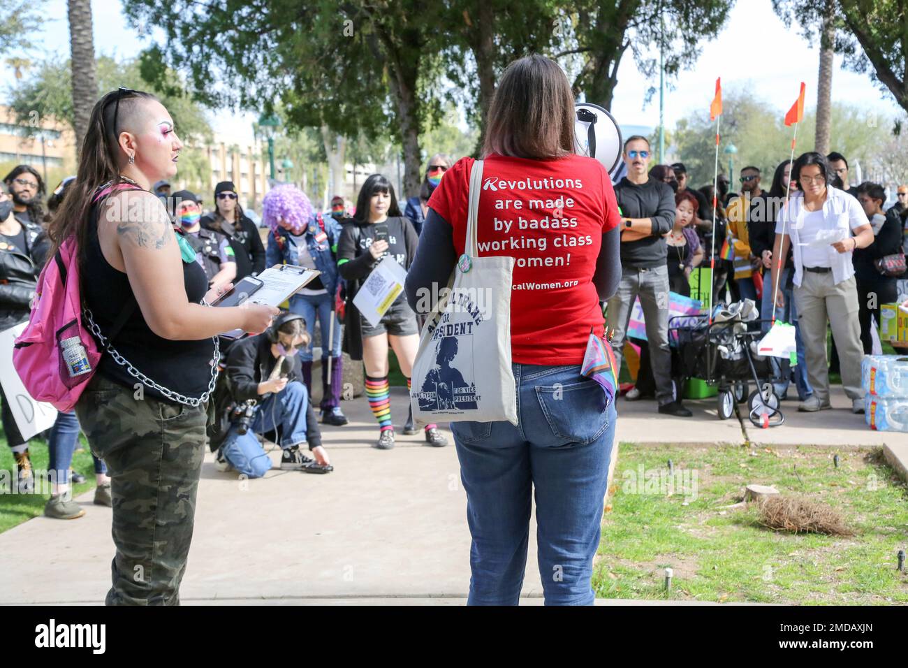A spokesperson from Radical Women Phoenix makes a speech to the crowd ...