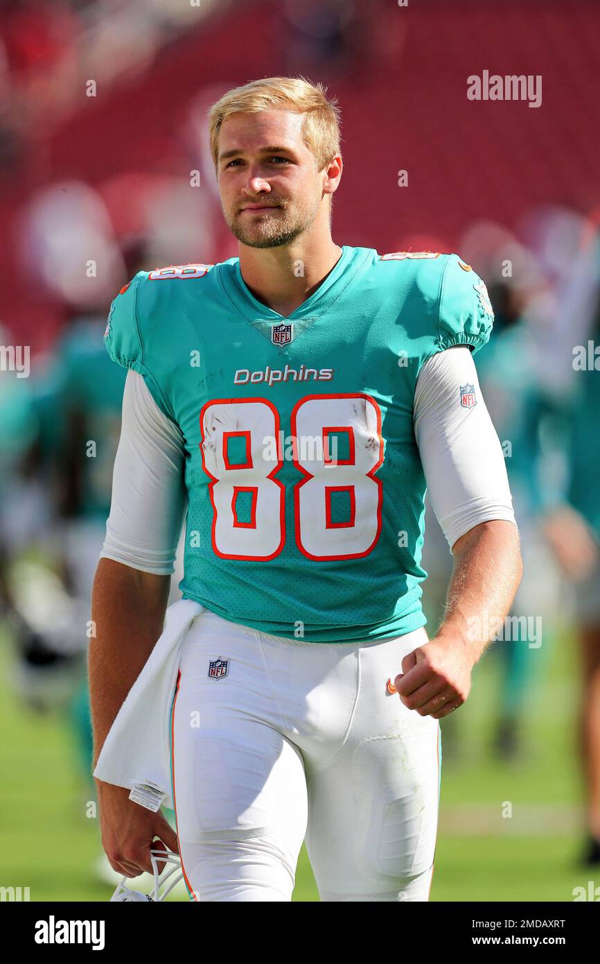 Miami Dolphins tight end Mike Gesicki (88) walks off the field during a NFL football game ...