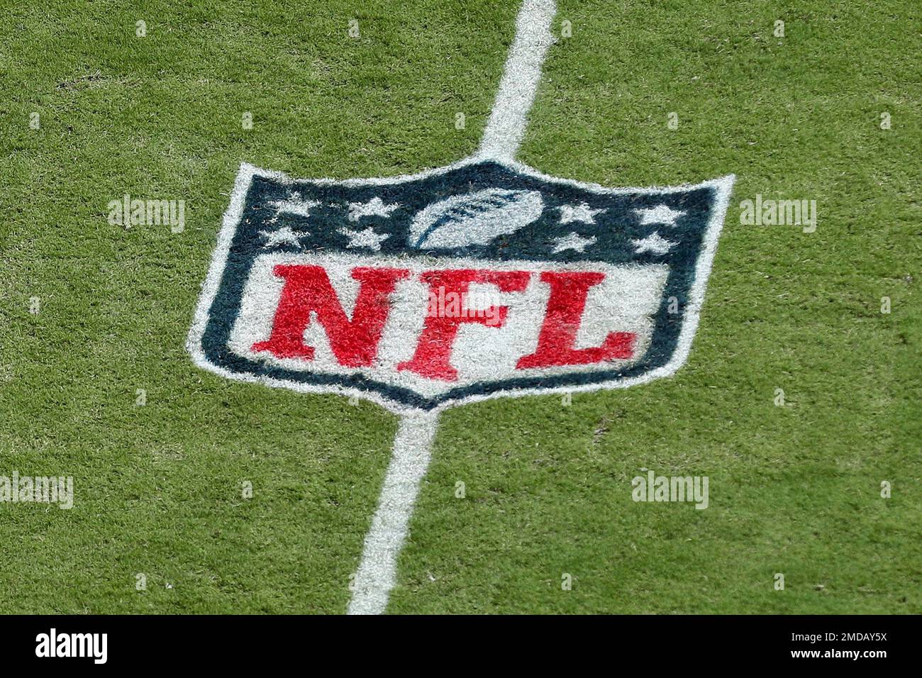 The National Football League logo is seen on the field during a NFL ...