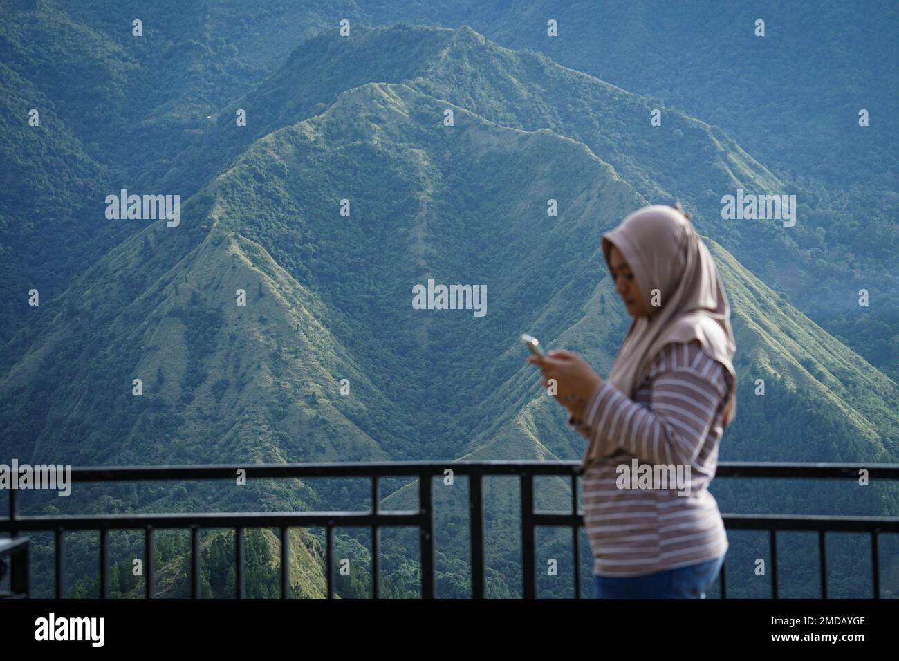 Enrekang, South Sulawesi, Indonesia. 23rd Jan, 2023. A woman is sitting ...