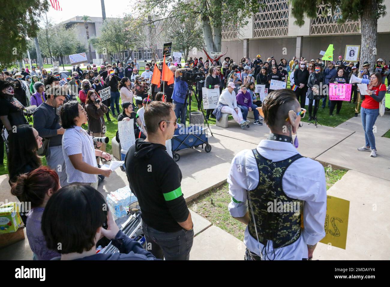 A spokesperson from Radical Women Phoenix makes a speech to the crowd ...
