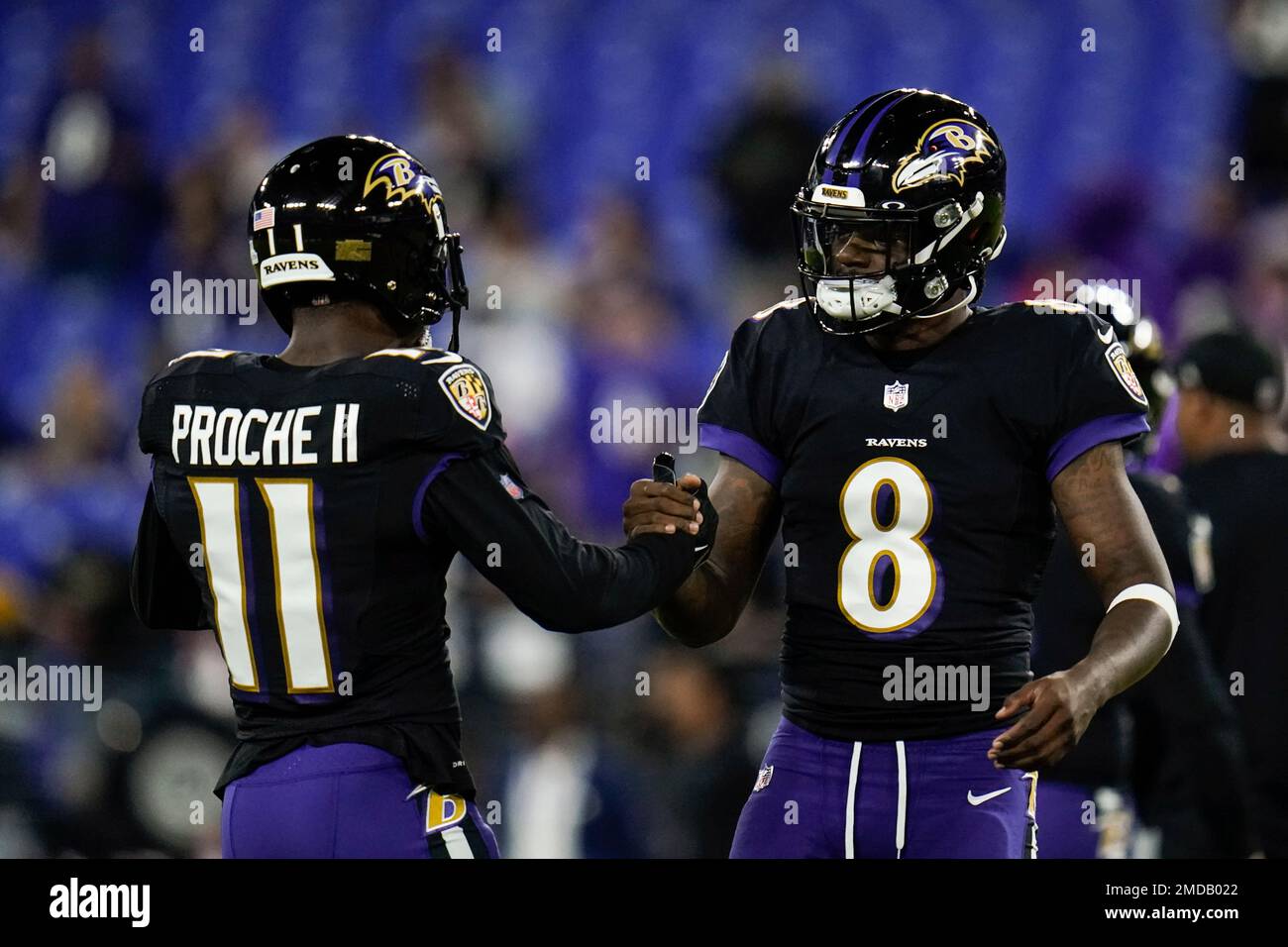 Baltimore Ravens wide receiver James Proche (11) and quarterback Lamar ...