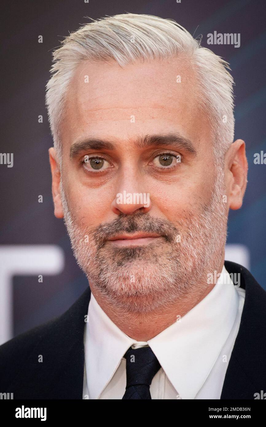 Ian Canning poses for photographers upon arrival at the premiere of the ...