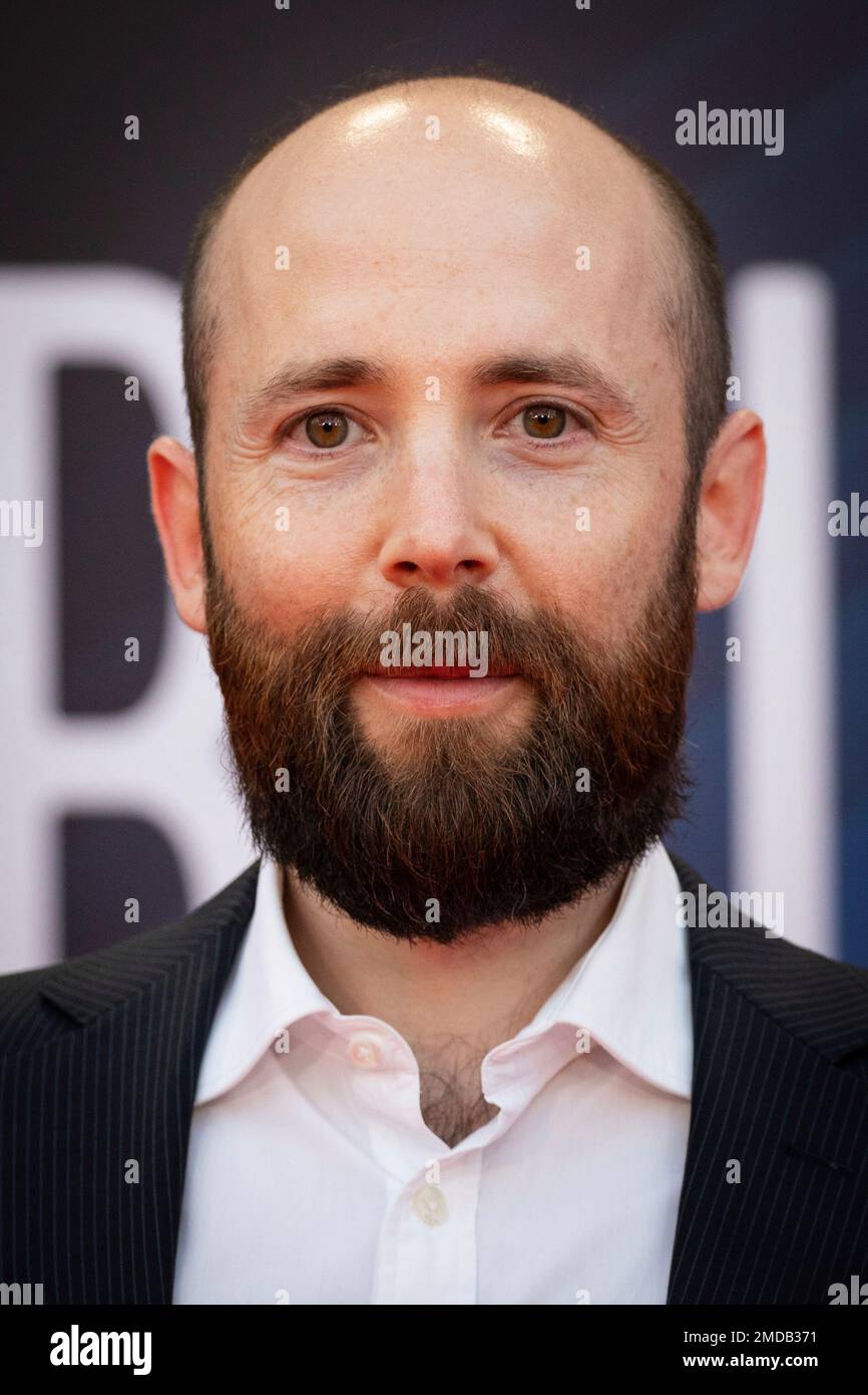 Simon Gillis poses for photographers upon arrival at the premiere of ...