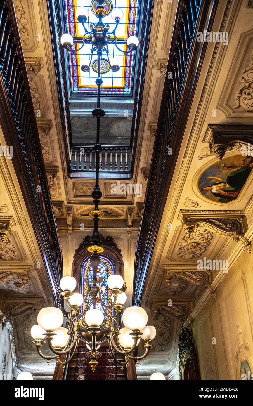 ceiling light and stained glass window in the ceiling above the grand ...