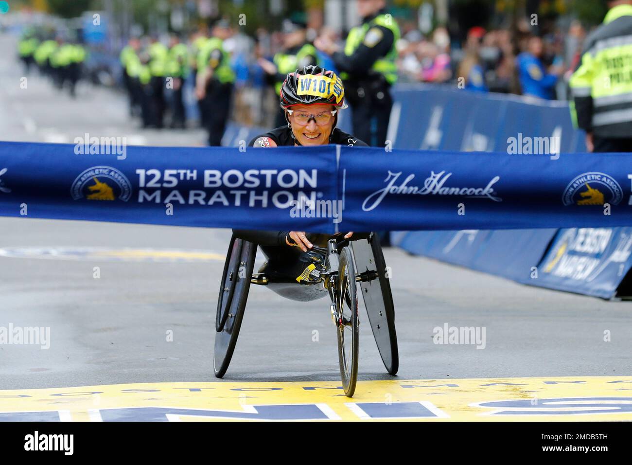 Manuela Schar, of Switzerland, approaches the tape to win the women's ...