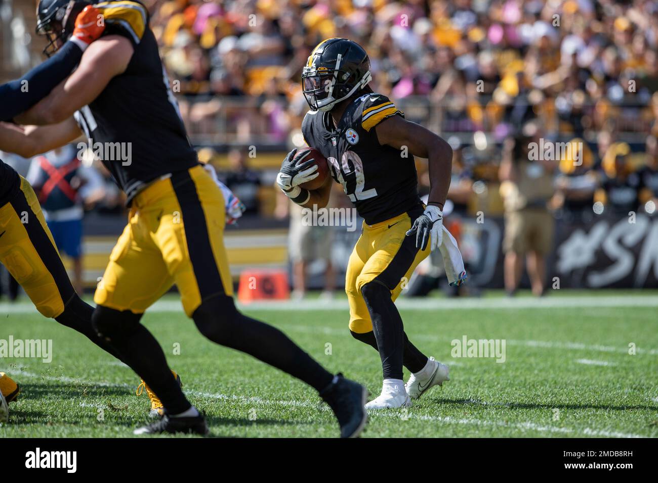 Pittsburgh Steelers running back Najee Harris (22) looks for room to ...