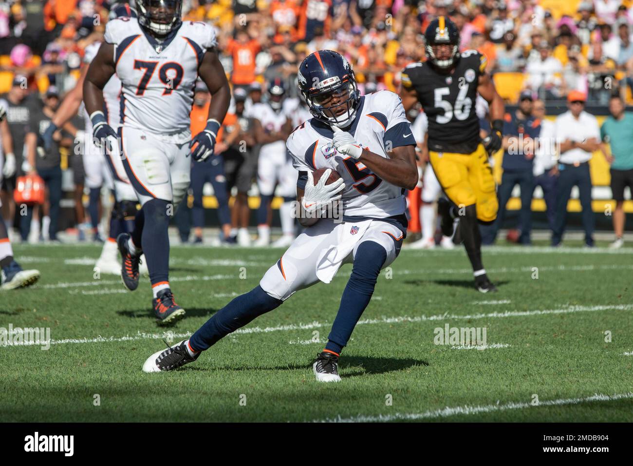 Denver Broncos quarterback Teddy Bridgewater (5) rushes against the ...