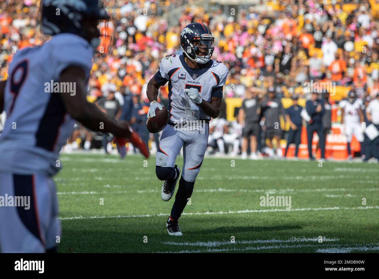 Denver Broncos quarterback Teddy Bridgewater (5) scrambles during an ...