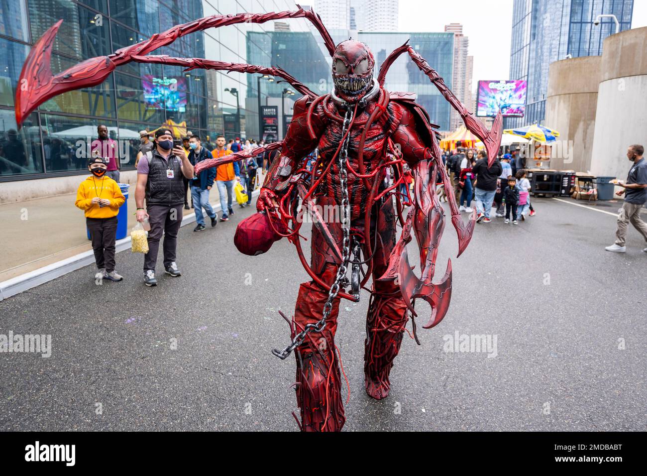 An attendee dressed as Carnage poses during New York Comic Con at the ...