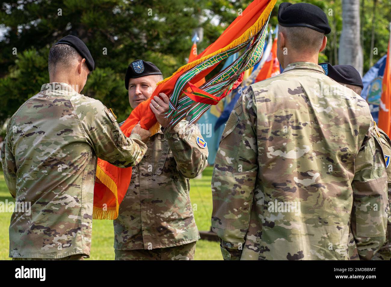 U.S. Army Pacific Commander Gen. Charles A. Flynn hands off the guidon ...