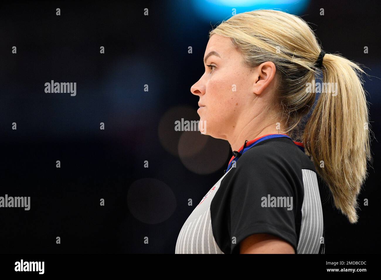 Referee Jenna Schroeder stands on the court during the second half of ...