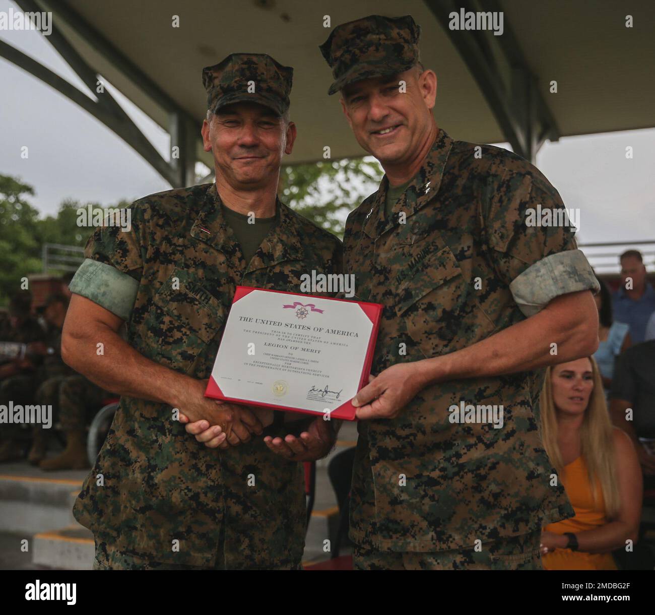 U.S. Marine Corps Chief Warrant Officer 5 Joshua S. Smith, left, and ...