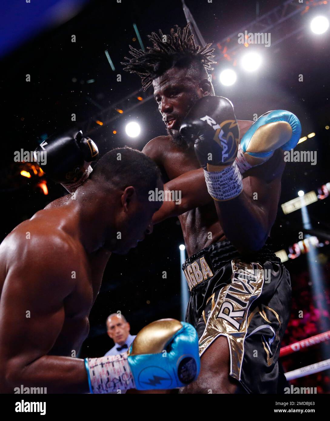 Efe Ajagba, right, of Nigeria, fights Frank Sanchez, of Cuba, in a ...