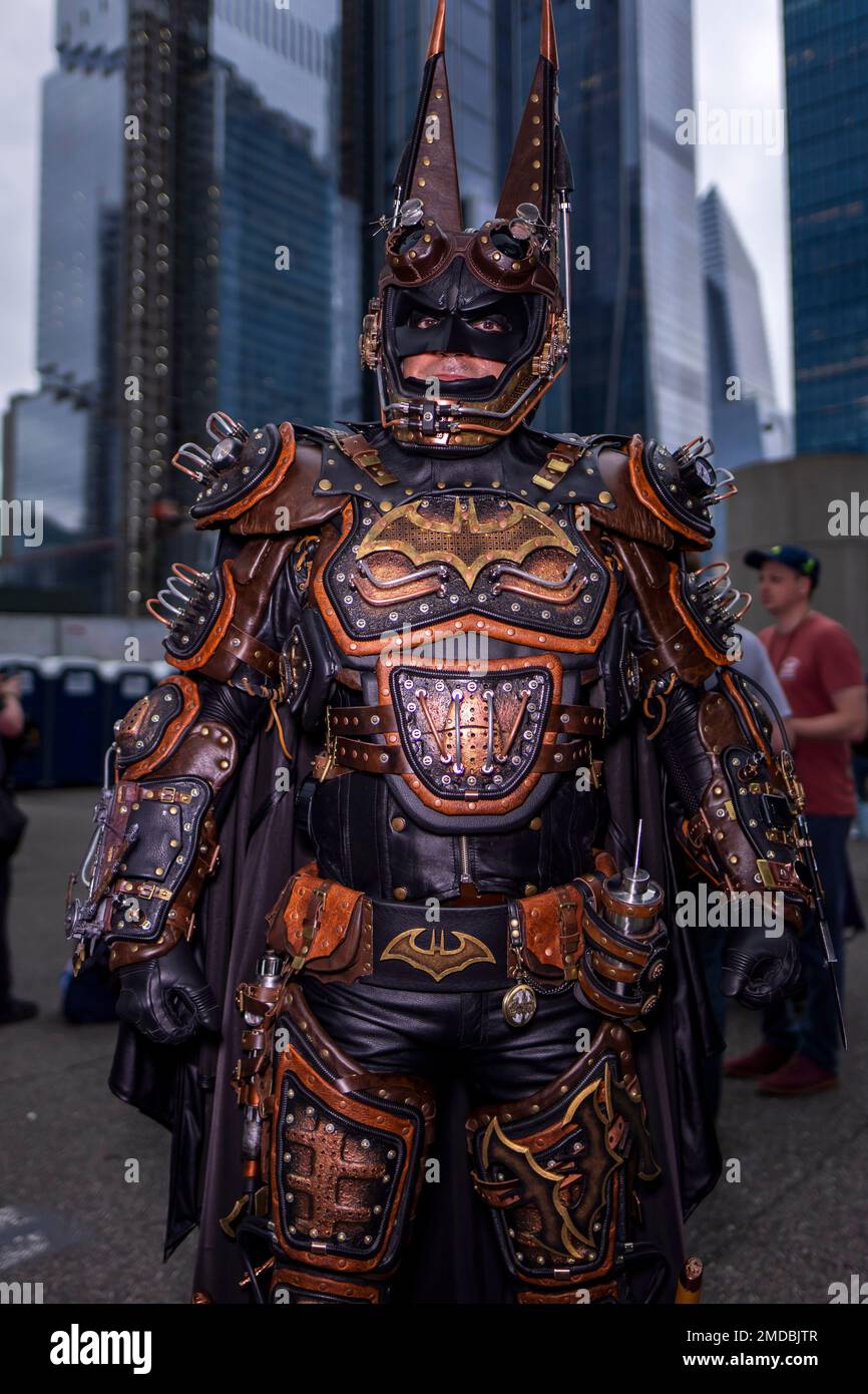 An attendee dressed as steampunk Batman poses during New York Comic Con ...