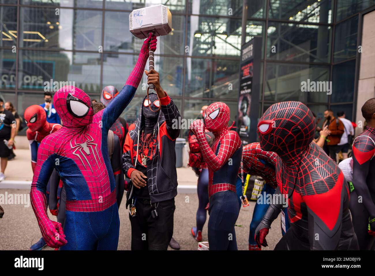 Attendees dressed as Spider-Man gather during New York Comic Con at the ...