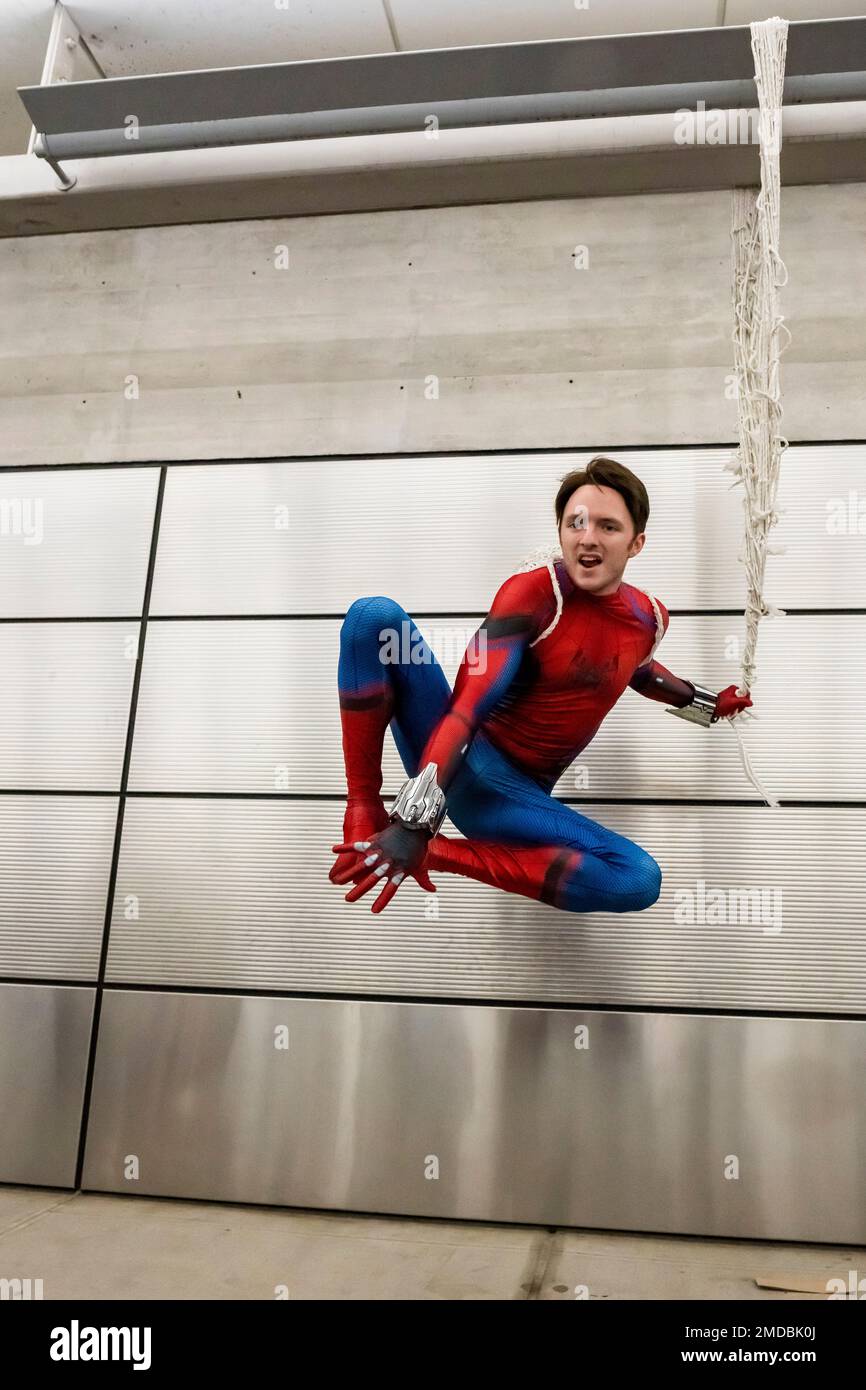 An attendee dressed as Spider-Man poses during New York Comic Con at ...