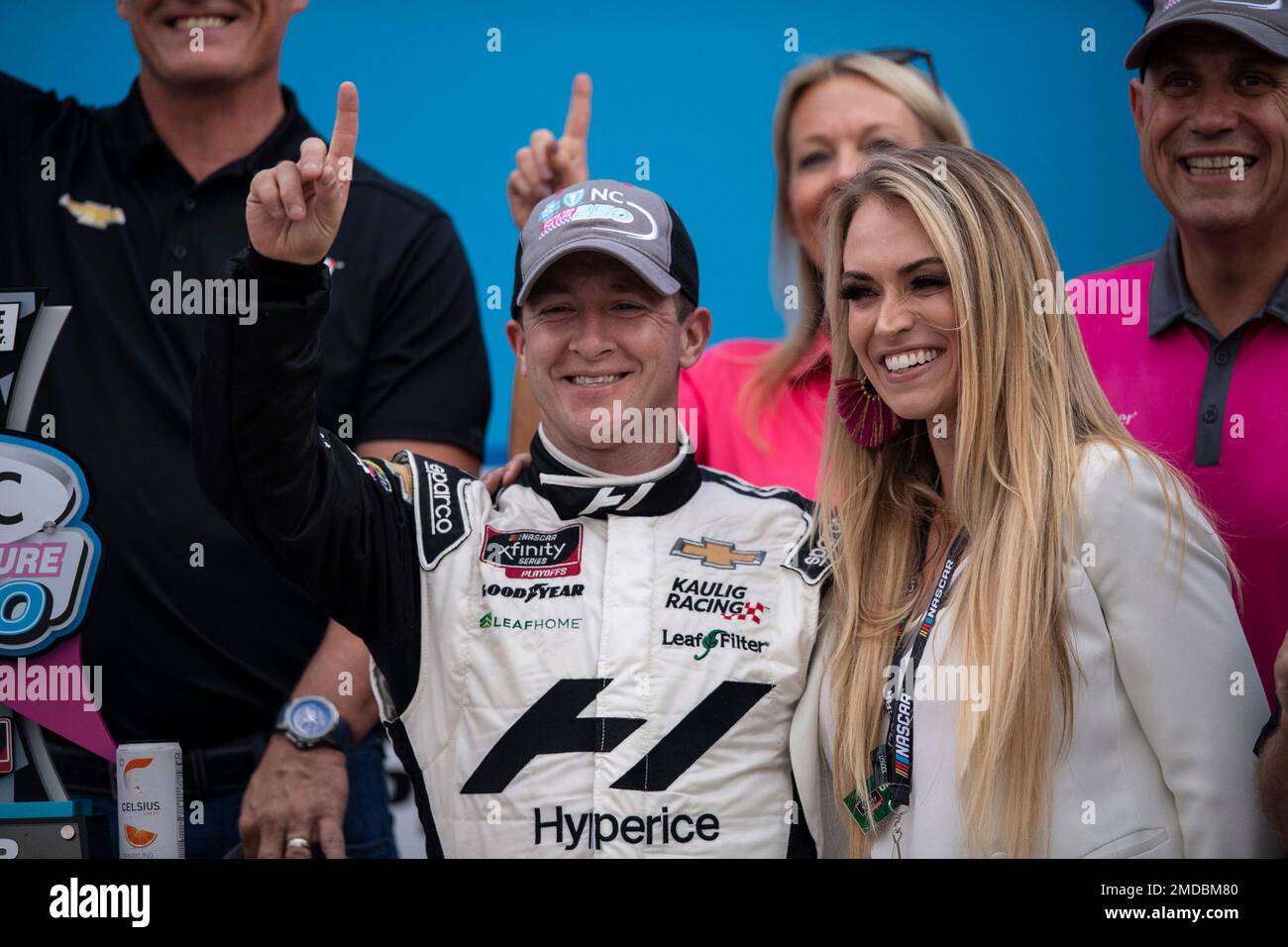 NASCAR Xfinity Series driver AJ Allmendinger (16) poses with his wife ...
