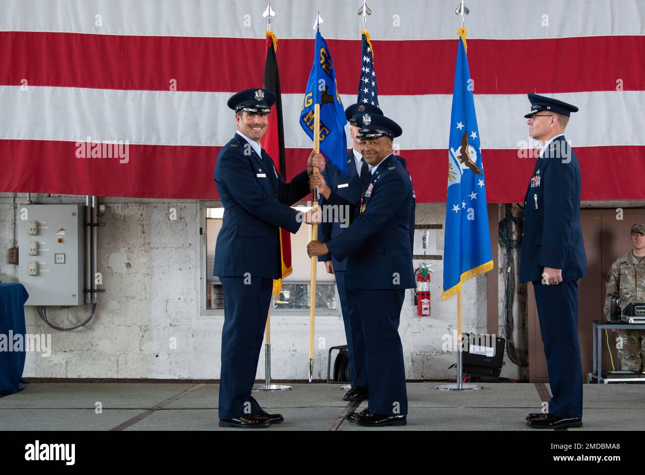 Col. Michael Clancy, center, 52nd Munitions Maintenance Group outgoing ...