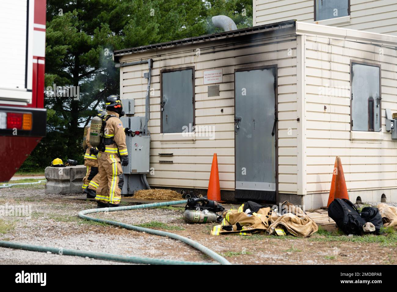 375th Civil Engineering squadron firefighters rehearse a basement fire ...