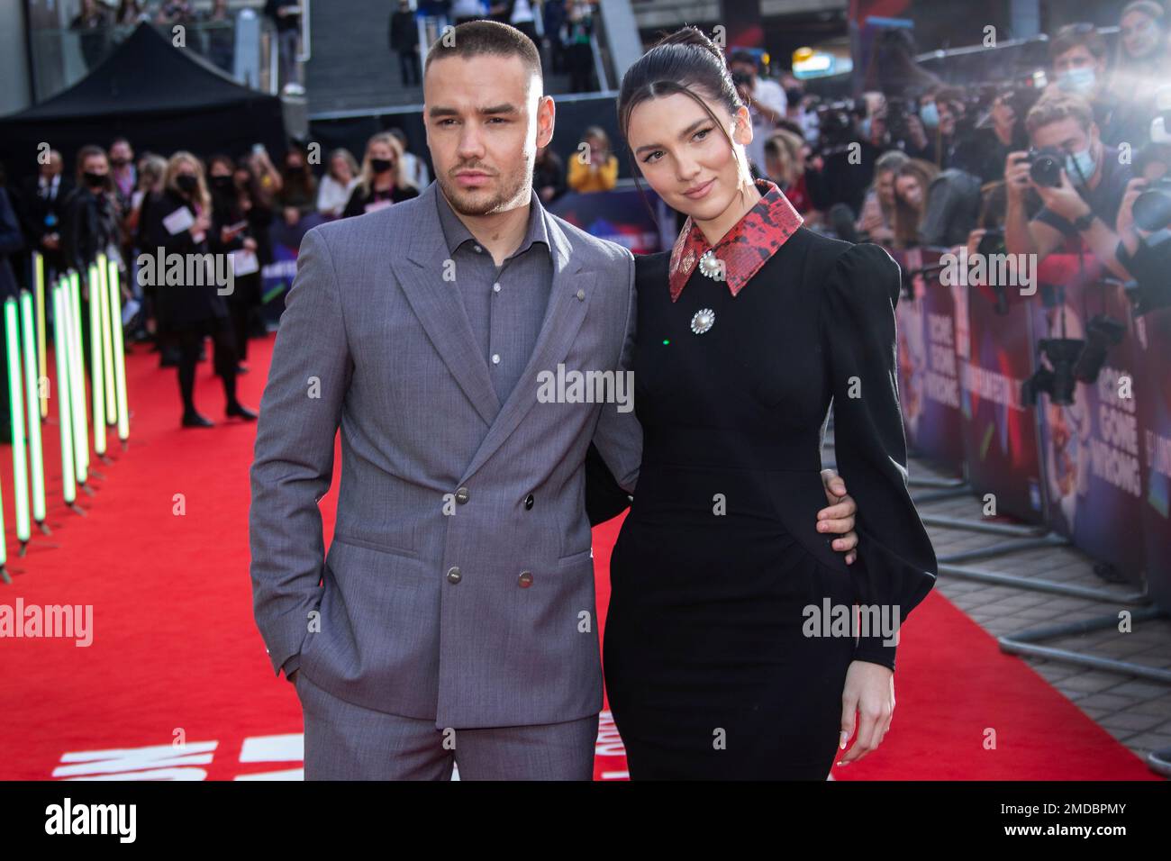Liam Payne and Maya Henry pose for photographers upon arrival at the ...