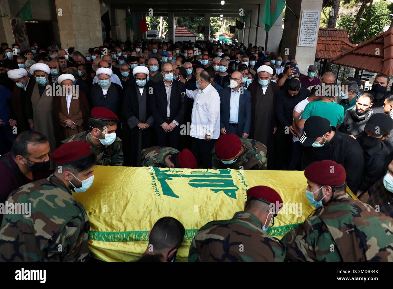 Hezbollah fighters carry the coffin of Ali Atwa, a senior Hezbollah ...