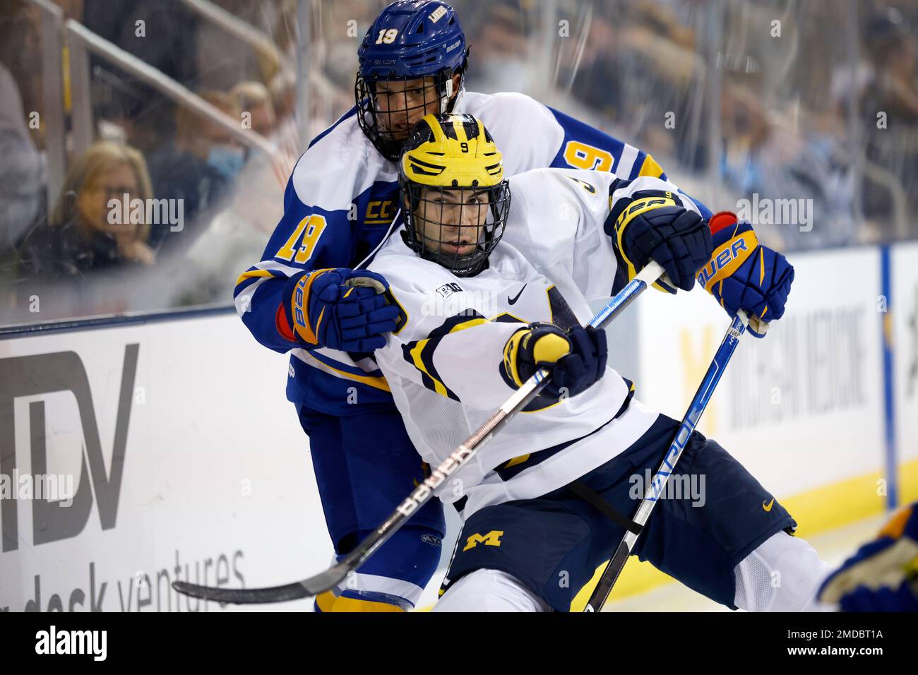 Michigan's Eric Ciccolini, right, and Lake Superior State's Joshua ...
