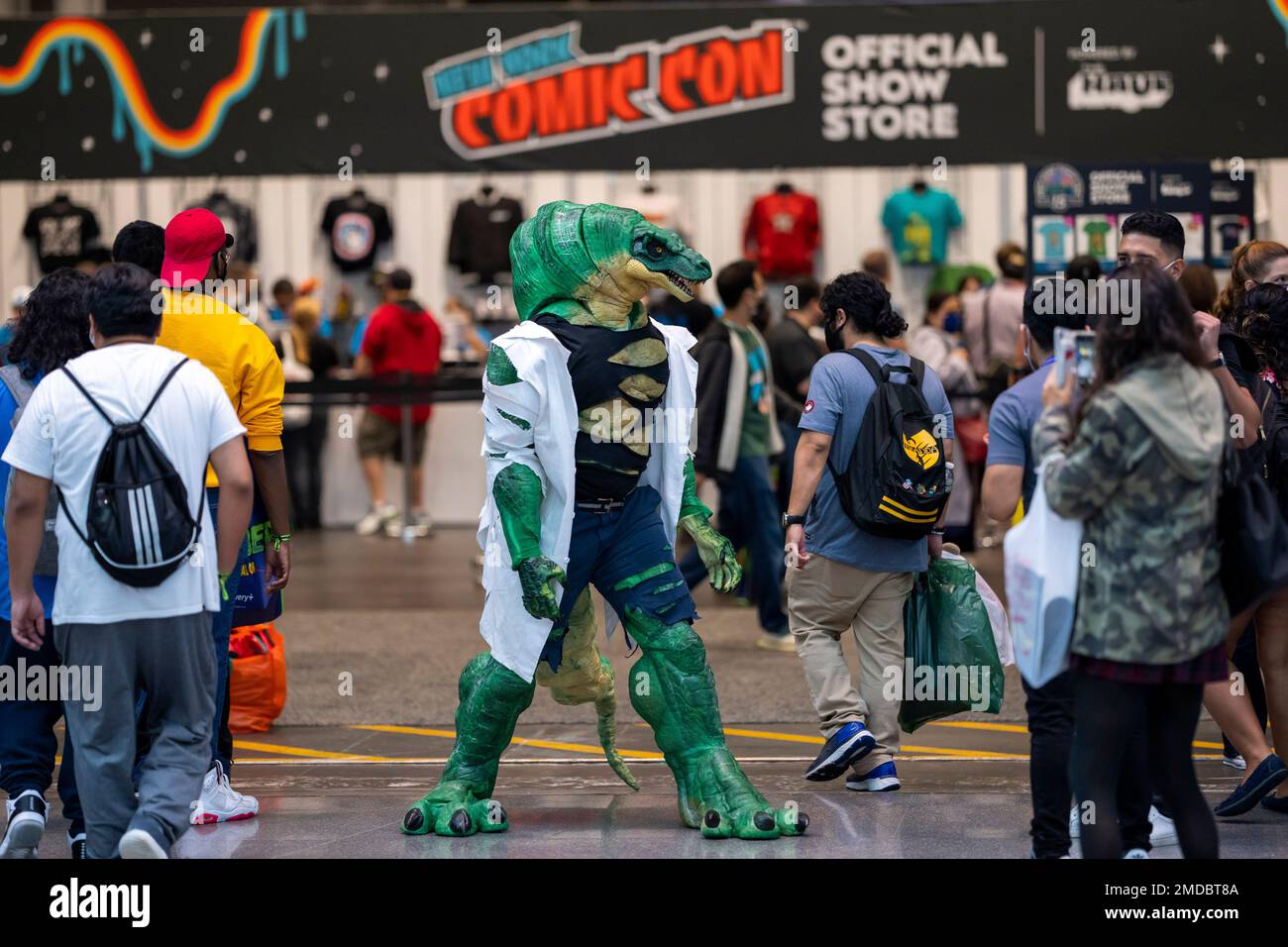 A costumed attendee walks the floor of the Jacob K. Javits Convention ...