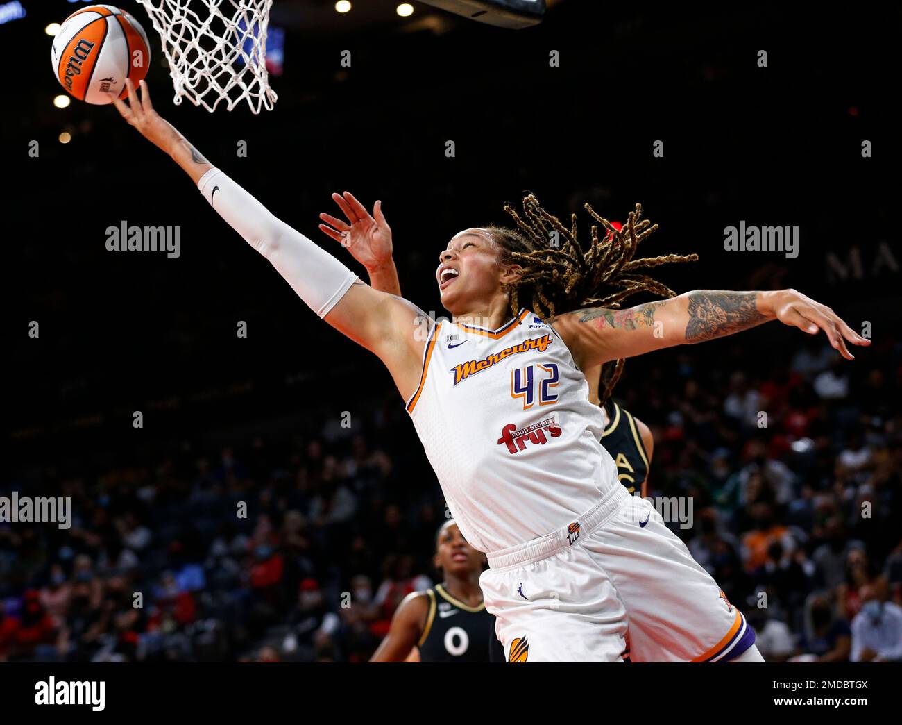 Phoenix Mercury center Brittney Griner (42) shoots next to Las Vegas ...
